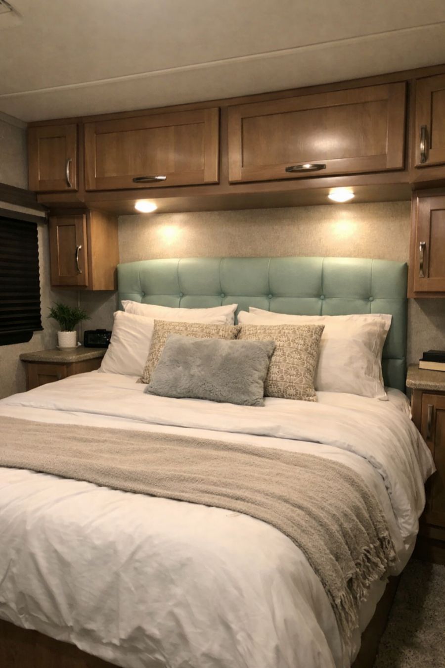 Head into this pearl white and mint accessible RV camper. You will not ...