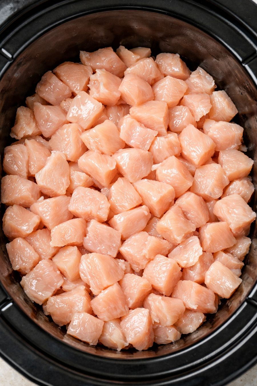 Toss raw diced chicken breast in the slow cooker and 4 everyday staples ...